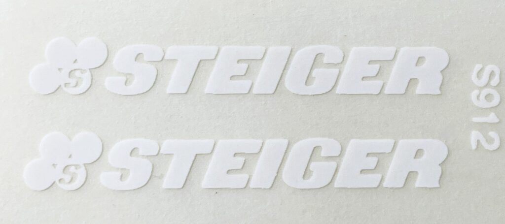 Decal Steiger Logo (white) - DS912 - 1 1/2" - Midwest Decals & Farm Toys